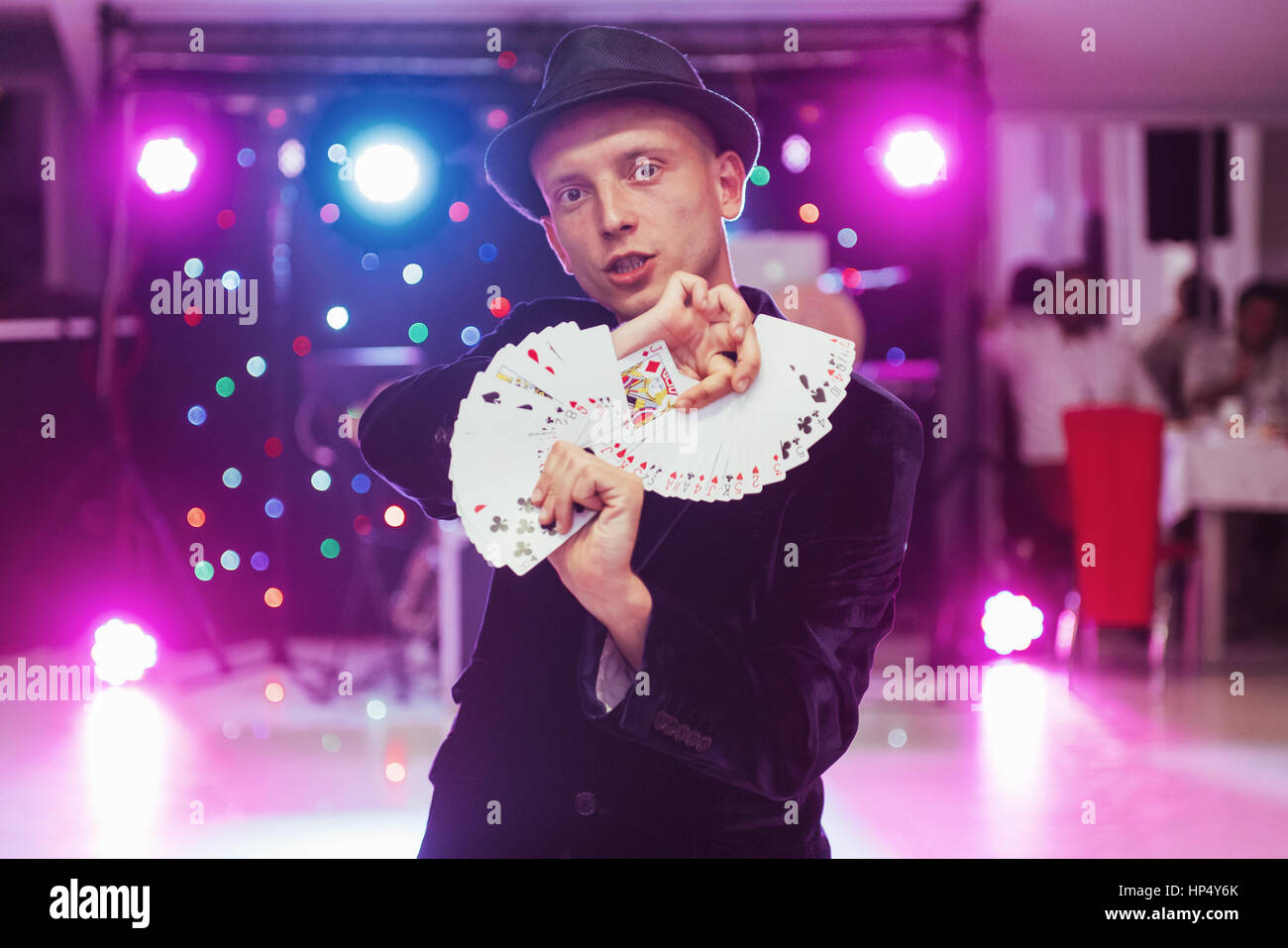 Magician showing trick with playing cards. Magic, circus Stock Photo ...