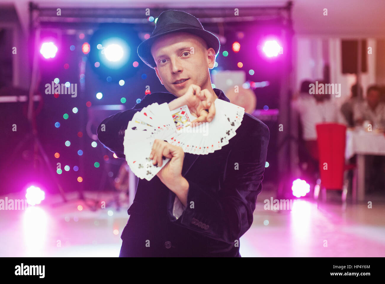 Magician showing trick with playing cards. Magic, circus Stock Photo ...