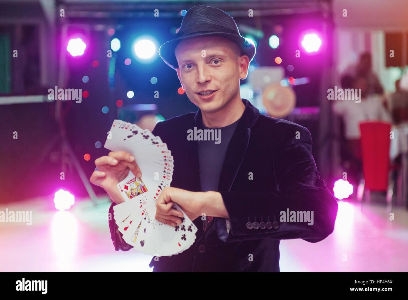 Magician showing trick with playing cards. Magic, circus Stock Photo ...