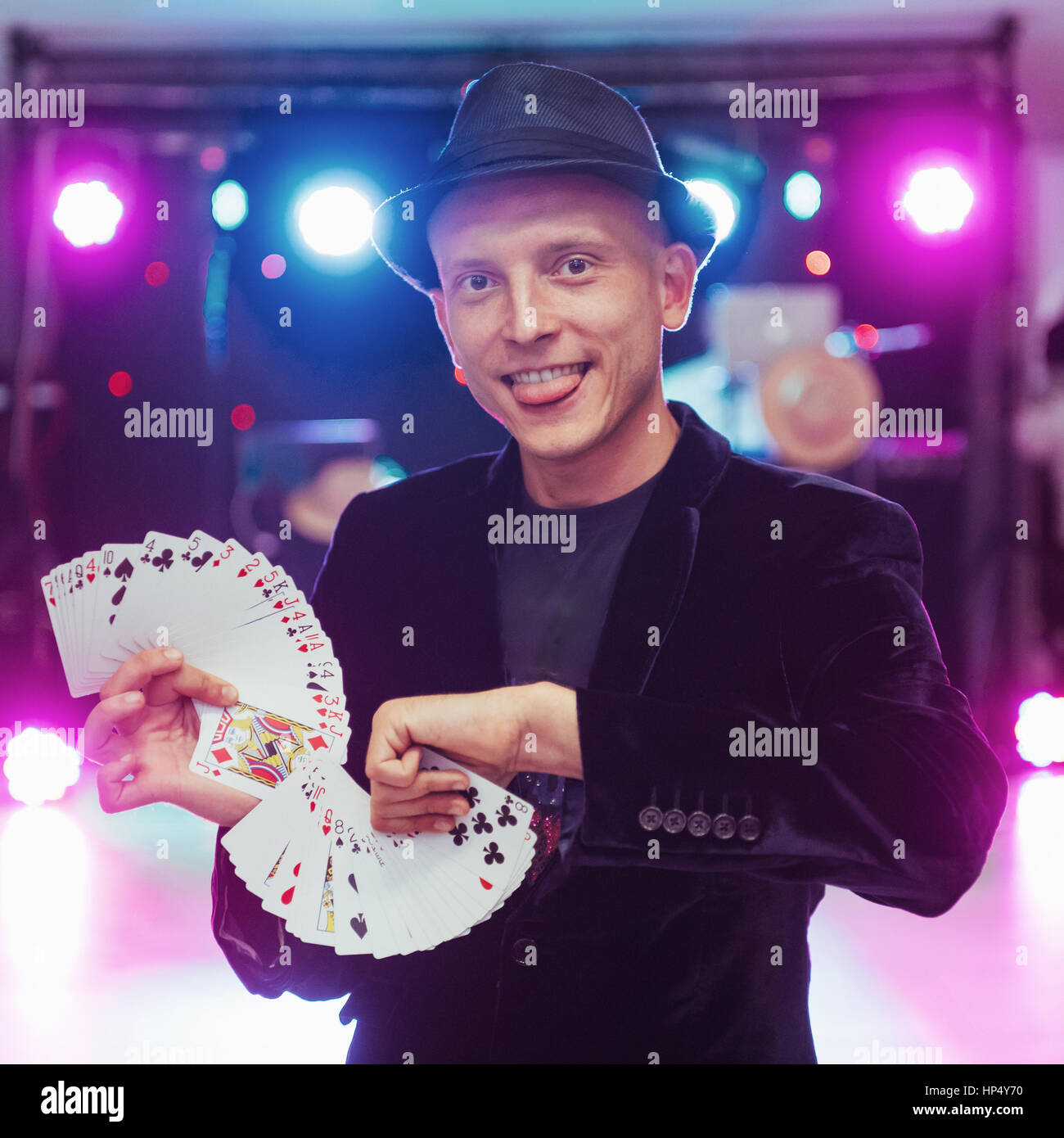 Magician showing trick with playing cards. Magic, circus Stock Photo ...