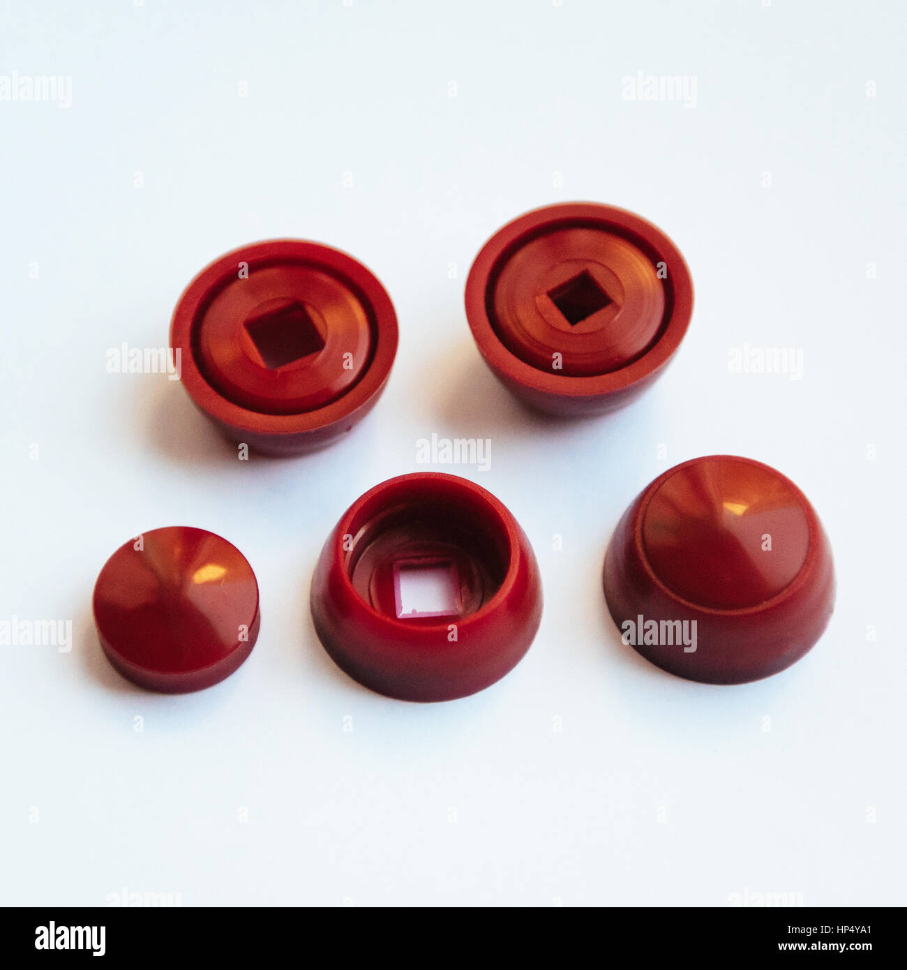 Colored plastic caps isolated on white background Stock Photo - Alamy