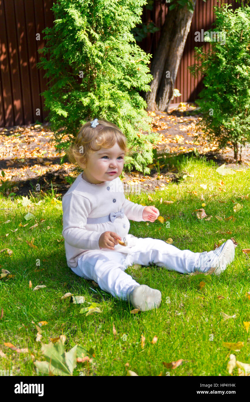 Caucasian beautiful cute infant girl in summer Stock Photo - Alamy