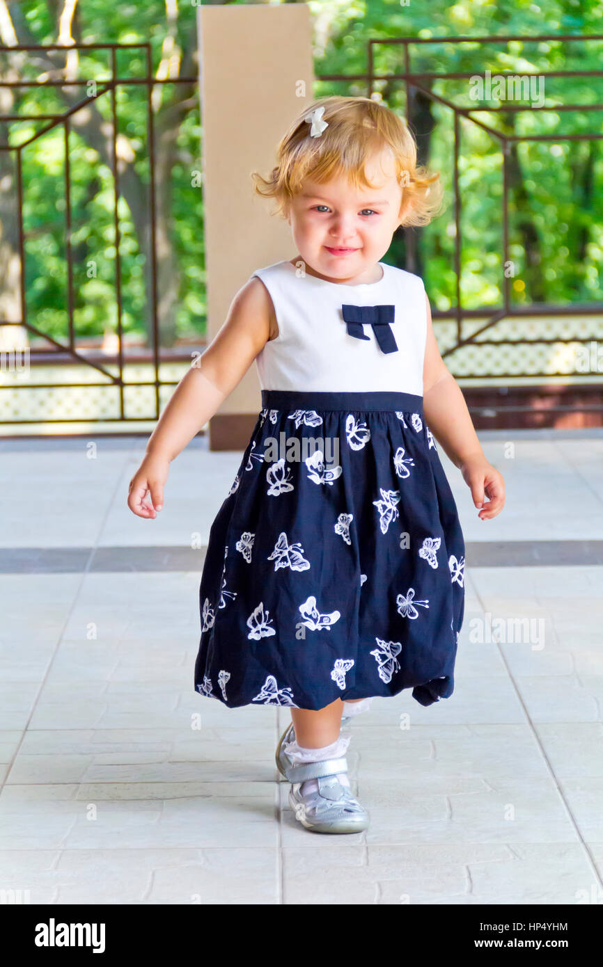 Caucasian beautiful cute infant girl in summer Stock Photo - Alamy
