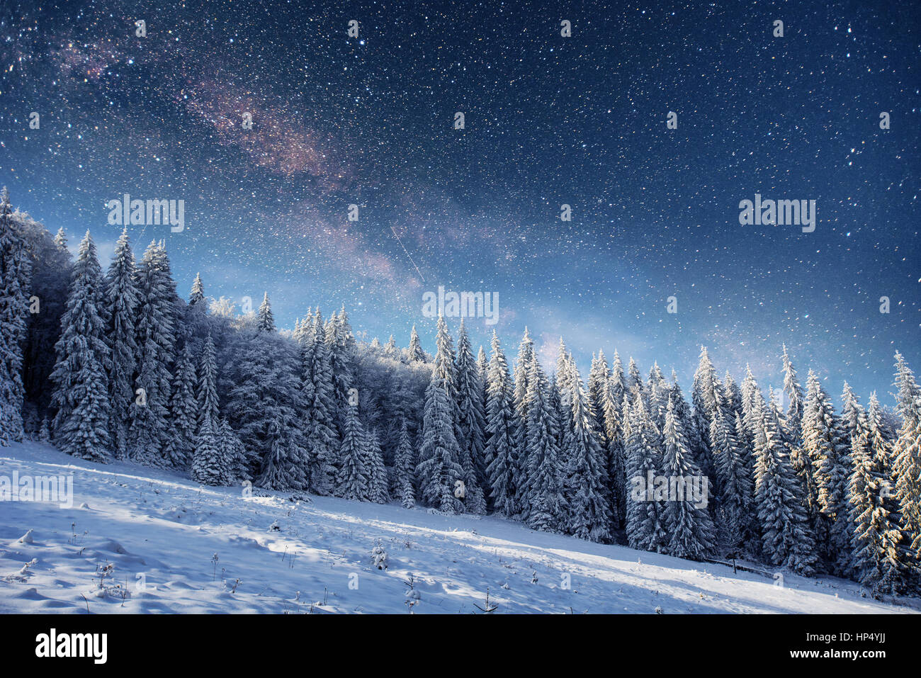 starry sky in winter snowy night. fantastic milky way Stock Photo - Alamy