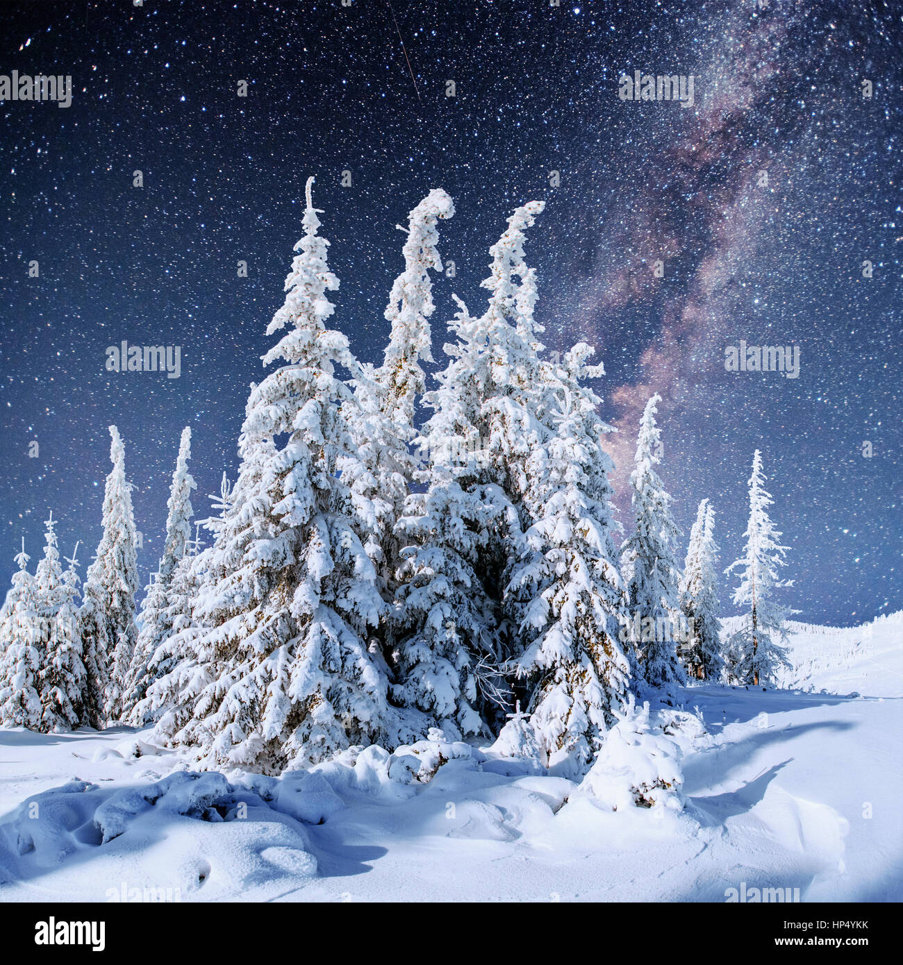 starry sky in winter snowy night. fantastic milky way Stock Photo - Alamy