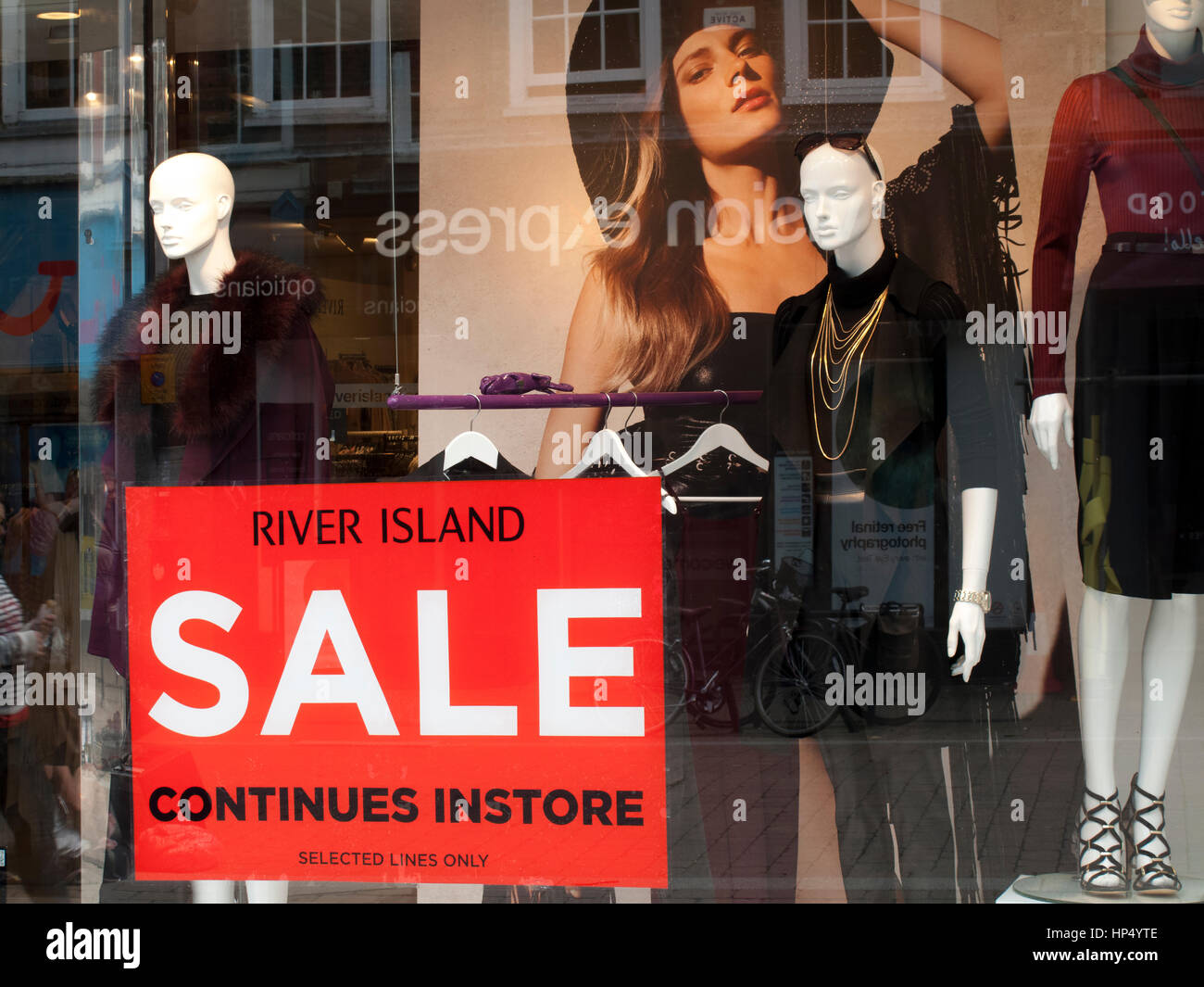River Island ladies and men clothing retailer window display, company ...