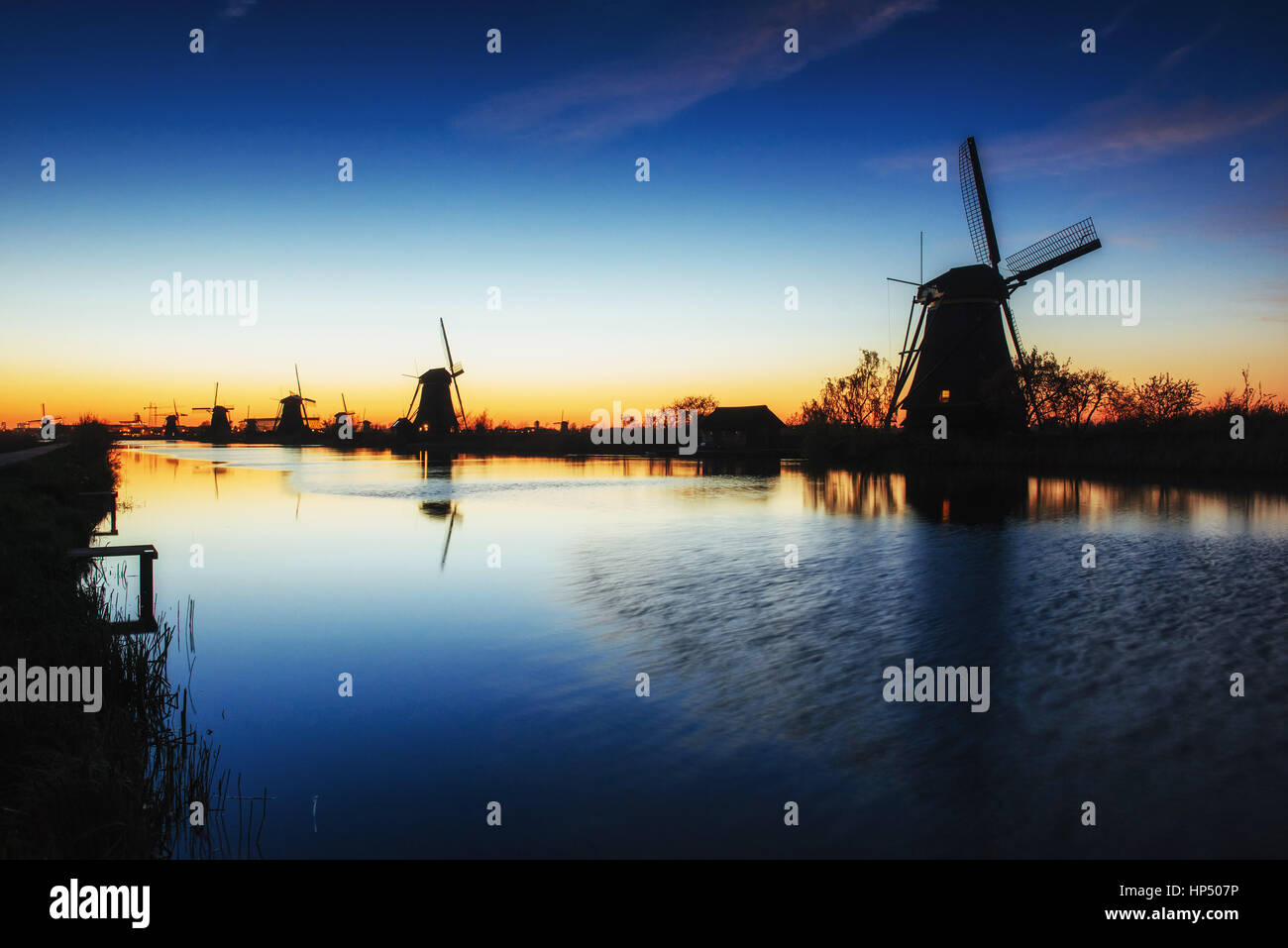 Fantastic sunset traditional Dutch windmills canal in Rotterdam Stock ...