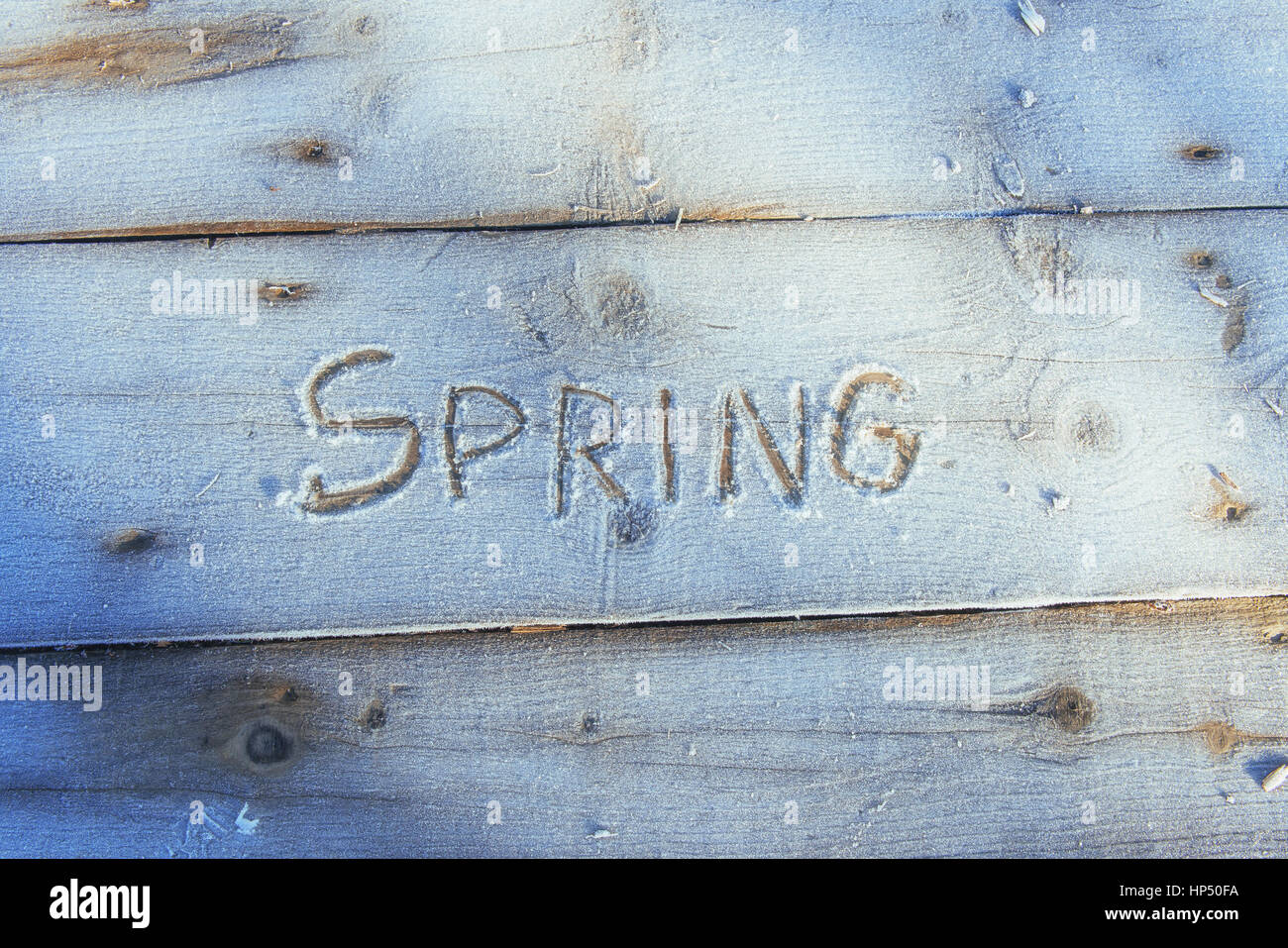 Writing on the snow. Wooden texture Stock Photo - Alamy