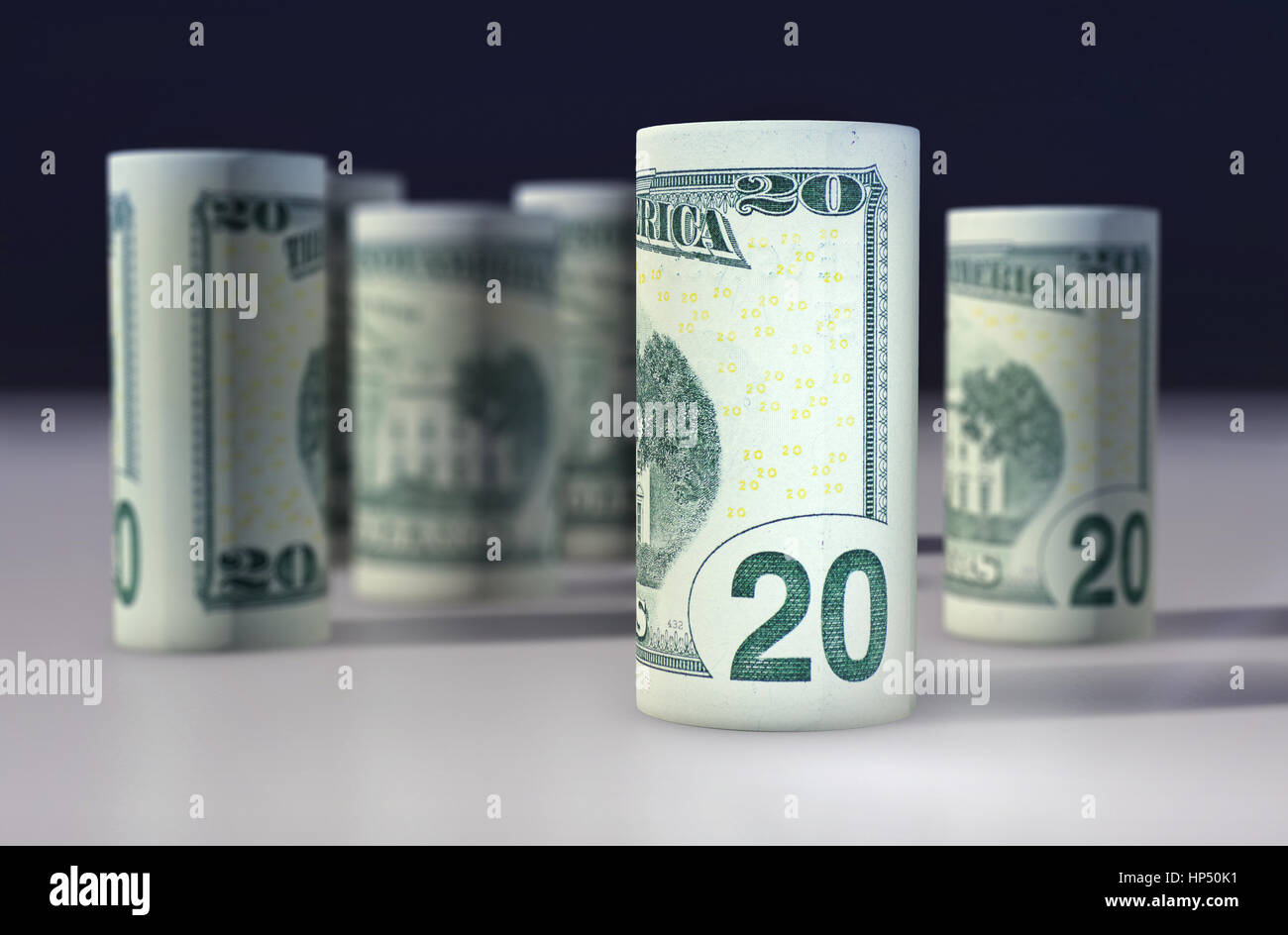 dollar bills roll isolated with white background Stock Photo - Alamy