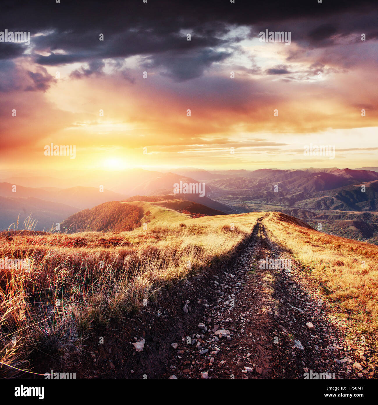 the winter road. Dramatic scene. Fantastic sunset Stock Photo - Alamy