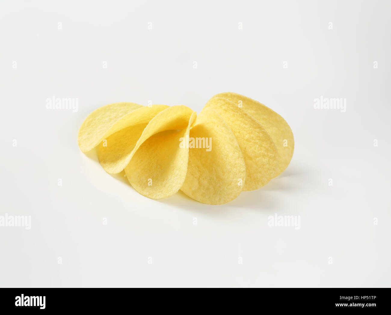 potato chips on white background Stock Photo - Alamy
