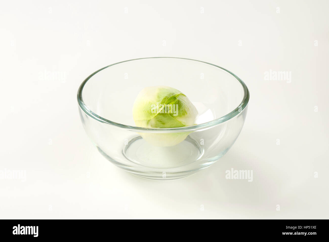 head of fresh belgian endive in glass bowl Stock Photo - Alamy