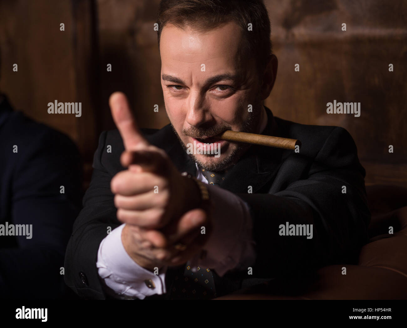 Rich businessman with cigar Stock Photo - Alamy