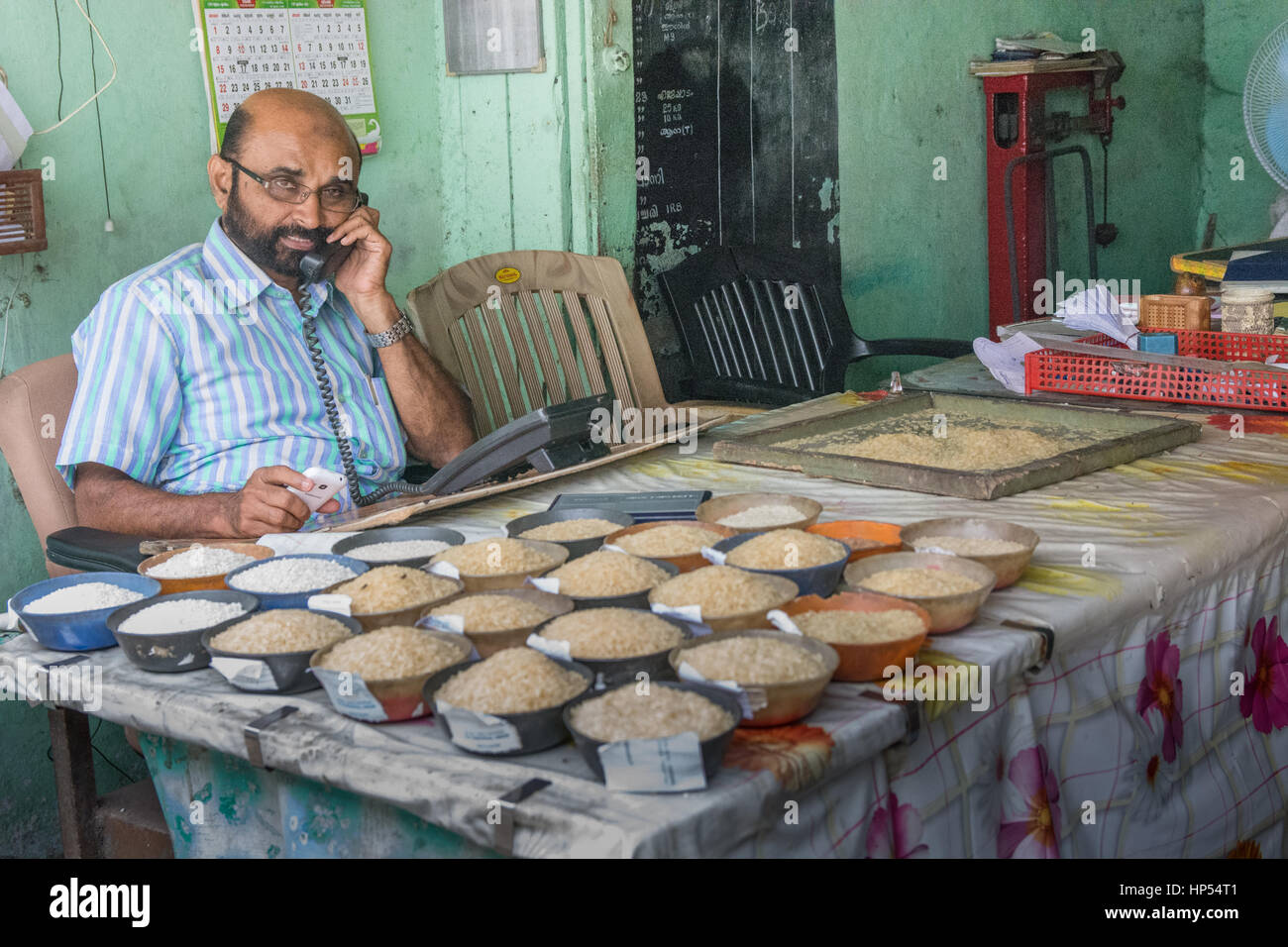 Mumbai, India - December 11, 2016 - Indian rice trader in his shop on ...