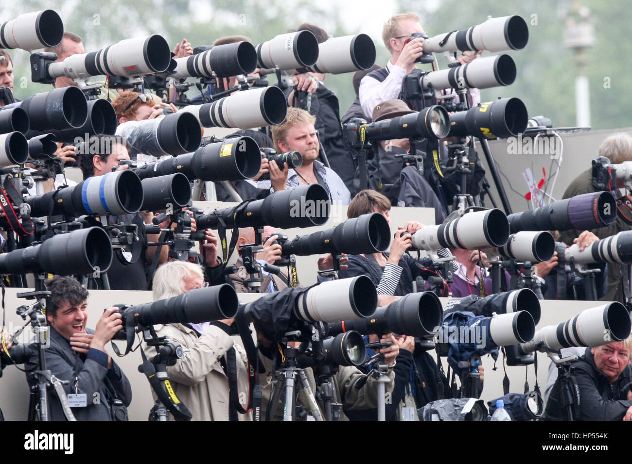 PRESS PHOTOGRAPHERS OUTSIDE BUCKINGHAM PALACE ON THE ROYAL WEDDING DAY ...