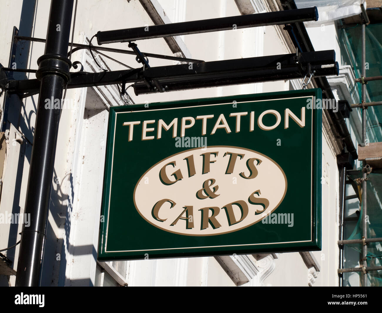 Temptation gifts and cards sign over store Stock Photo - Alamy