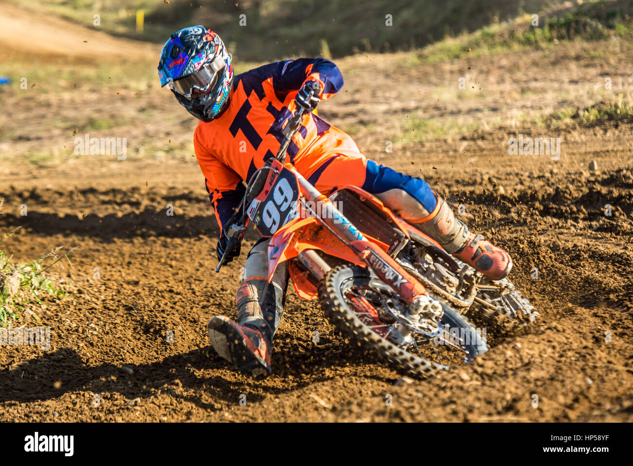 Motocross rider on the race Stock Photo - Alamy