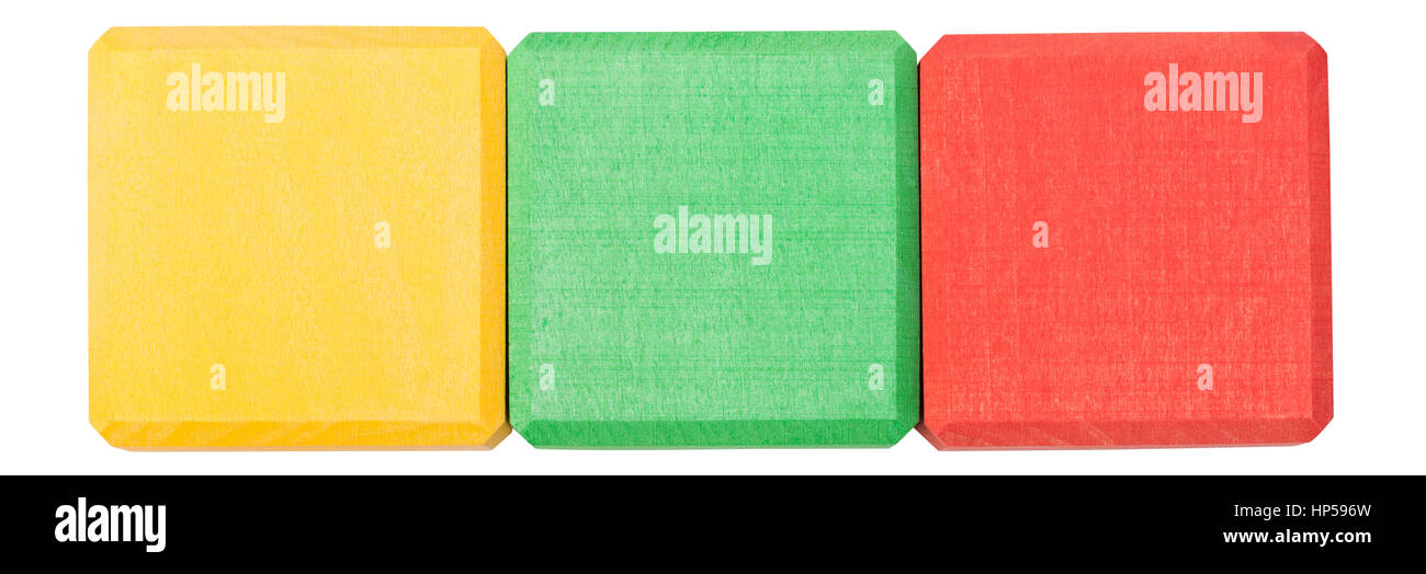 Red yellow green wooden blocks isolated on white background. Flat lay ...