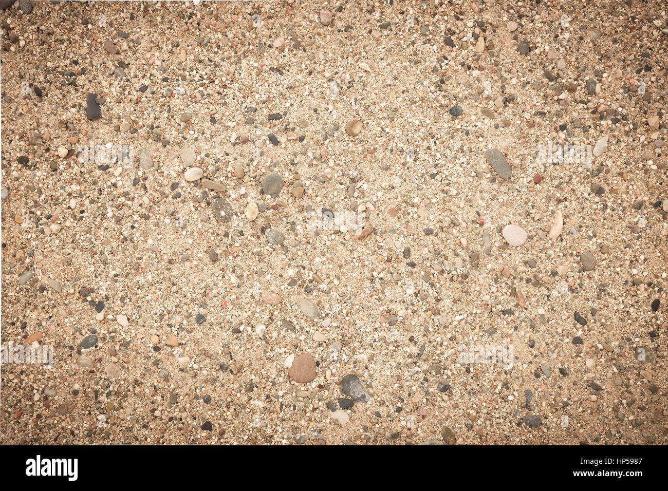 Pebble sand beach texture as background Stock Photo - Alamy