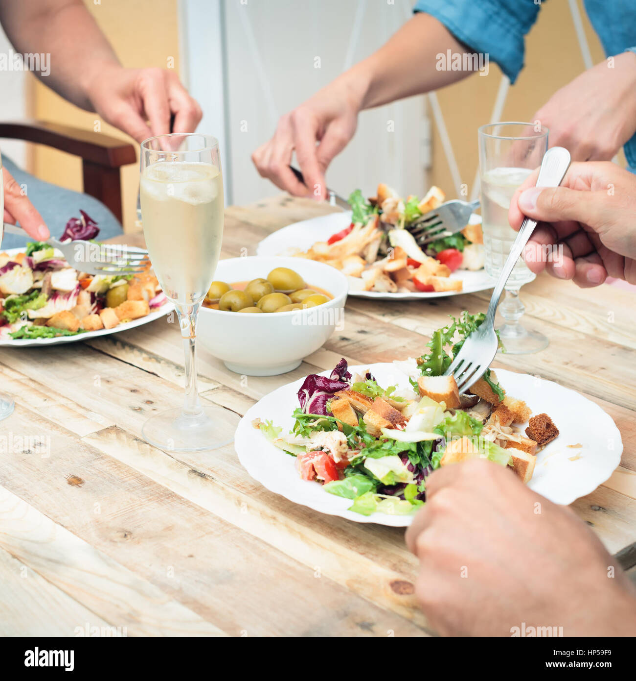 Closeup of friends having a lunch together on terrace Stock Photo - Alamy