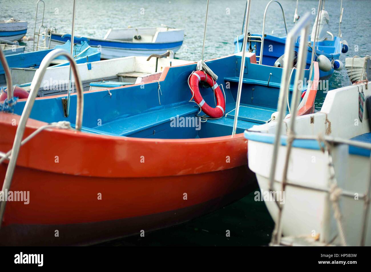 Closeup small boats in the port Stock Photo - Alamy