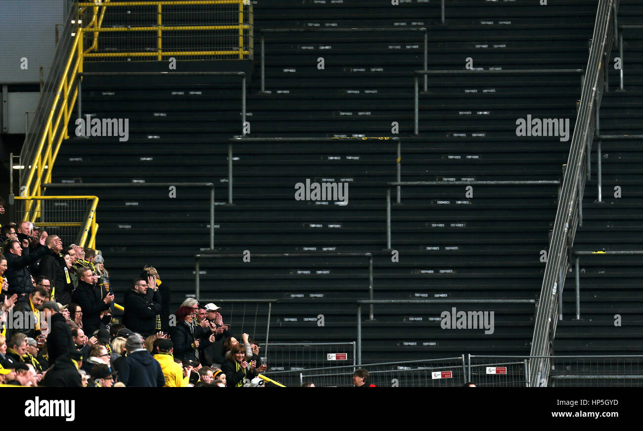 Dortmund, Germany. 18th Feb, 2017. Dortmund supporters celebrate their ...