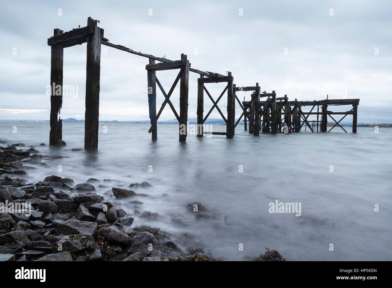 Forth River, UK. 18th Feb, 2017. The wooden pier at Aberdour on the ...