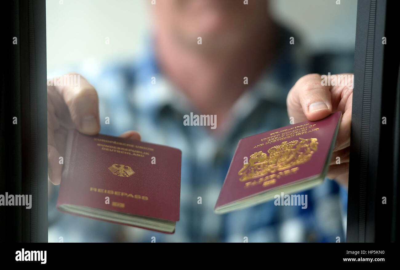 Man with british passport hi-res stock photography and images - Alamy