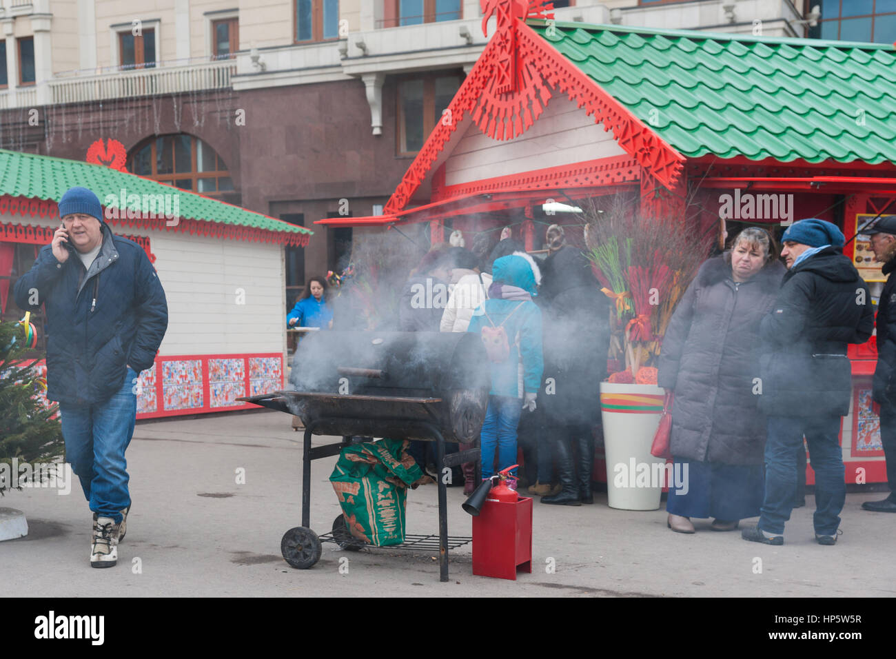 Moscow, Russia. Sunday, Feb. 19, 2017. Unidentified people by the snack ...
