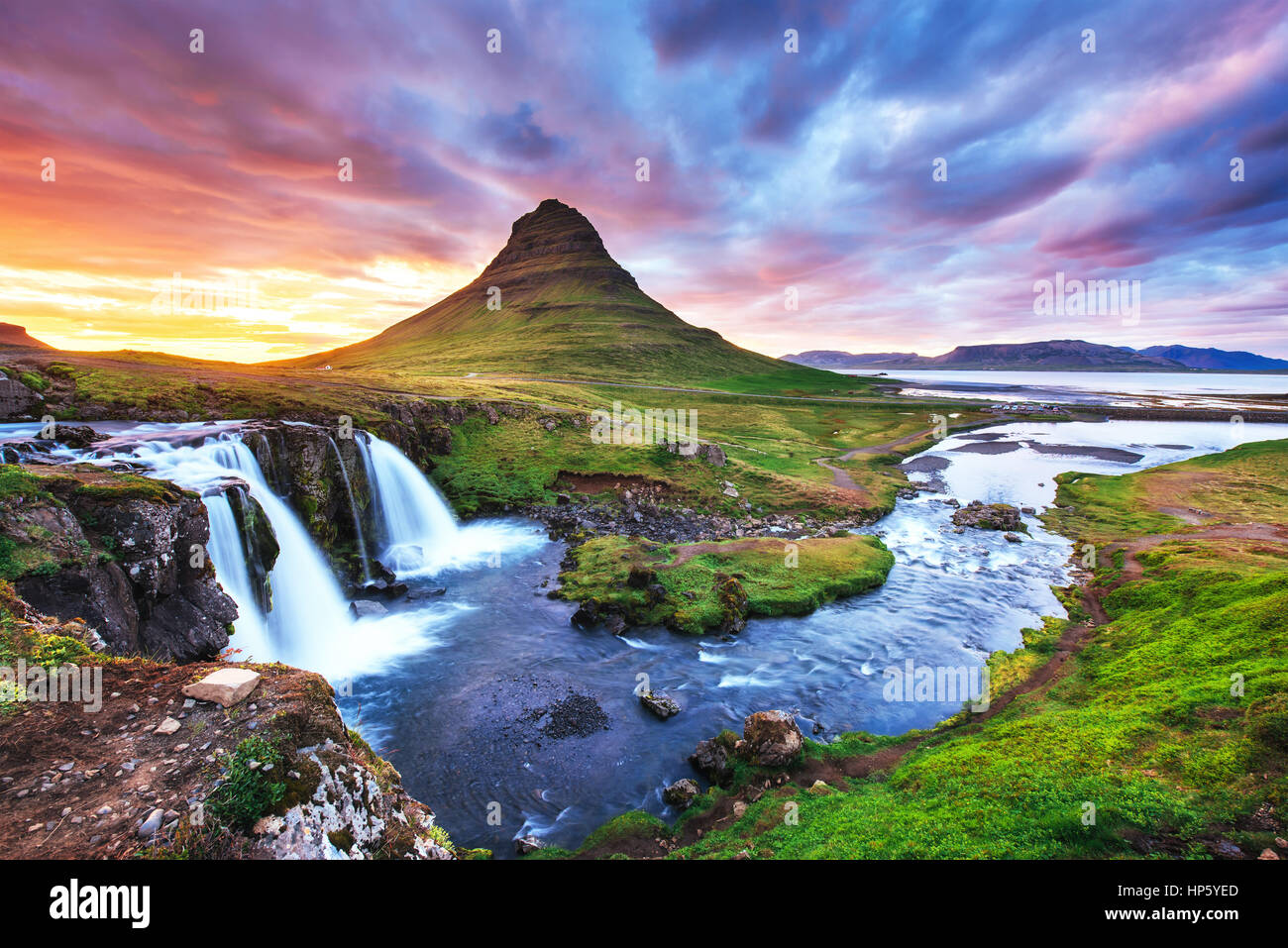 The picturesque sunset over landscapes and waterfalls. Kirkjufel Stock ...