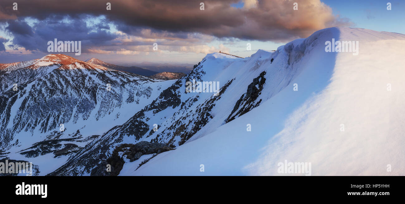 magical winter snow. Spring landscape. Dramatic cumulus clouds Stock ...