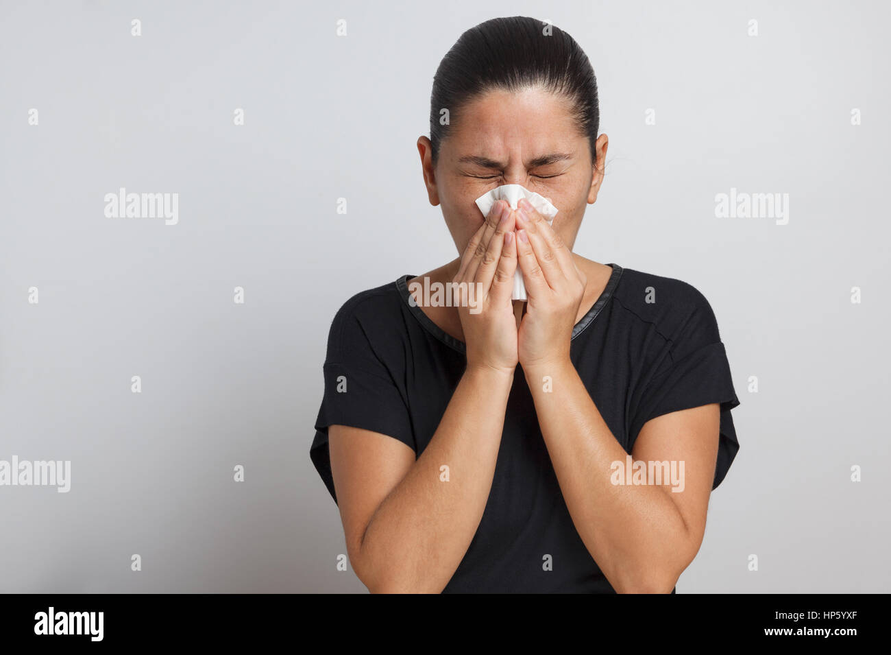 Female cold sneezing hi-res stock photography and images - Alamy