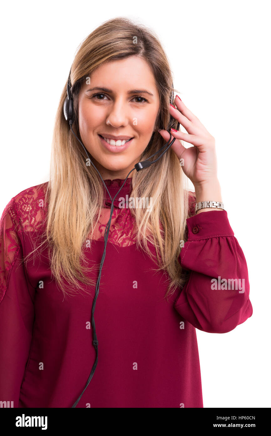 A friendly telephone operator smiling isolated over a white background Stock Photo - Alamy