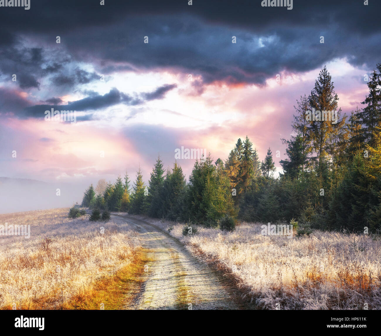 October mountain range in the first winter days. Road to hoarfro Stock ...