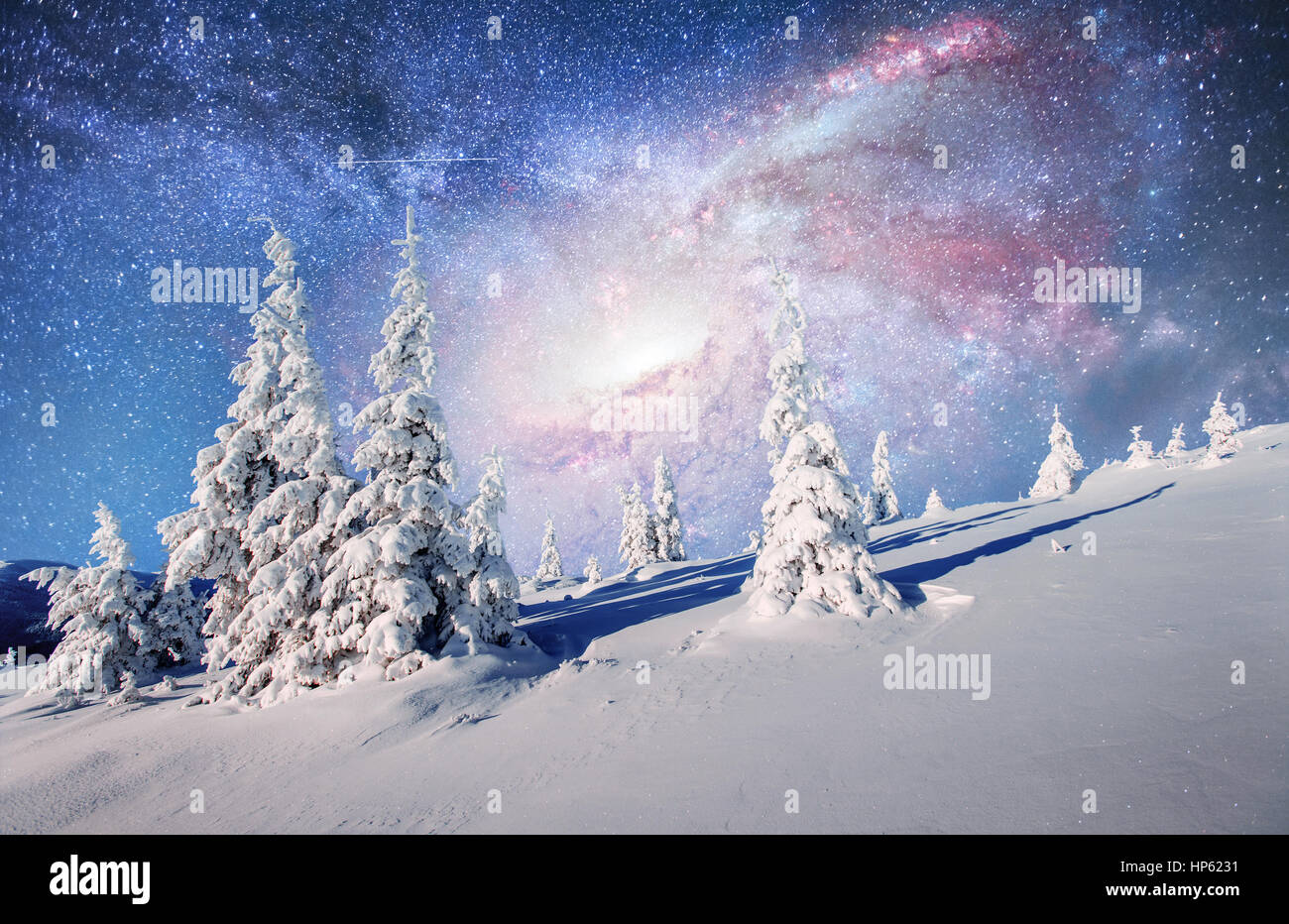 starry sky in winter snowy night. fantastic milky way in the New Stock Photo - Alamy