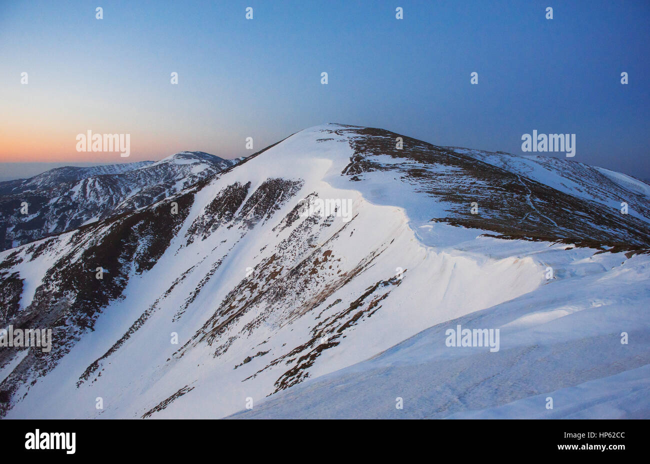 Colorful spring sunset over the mountain ranges in the national Stock ...