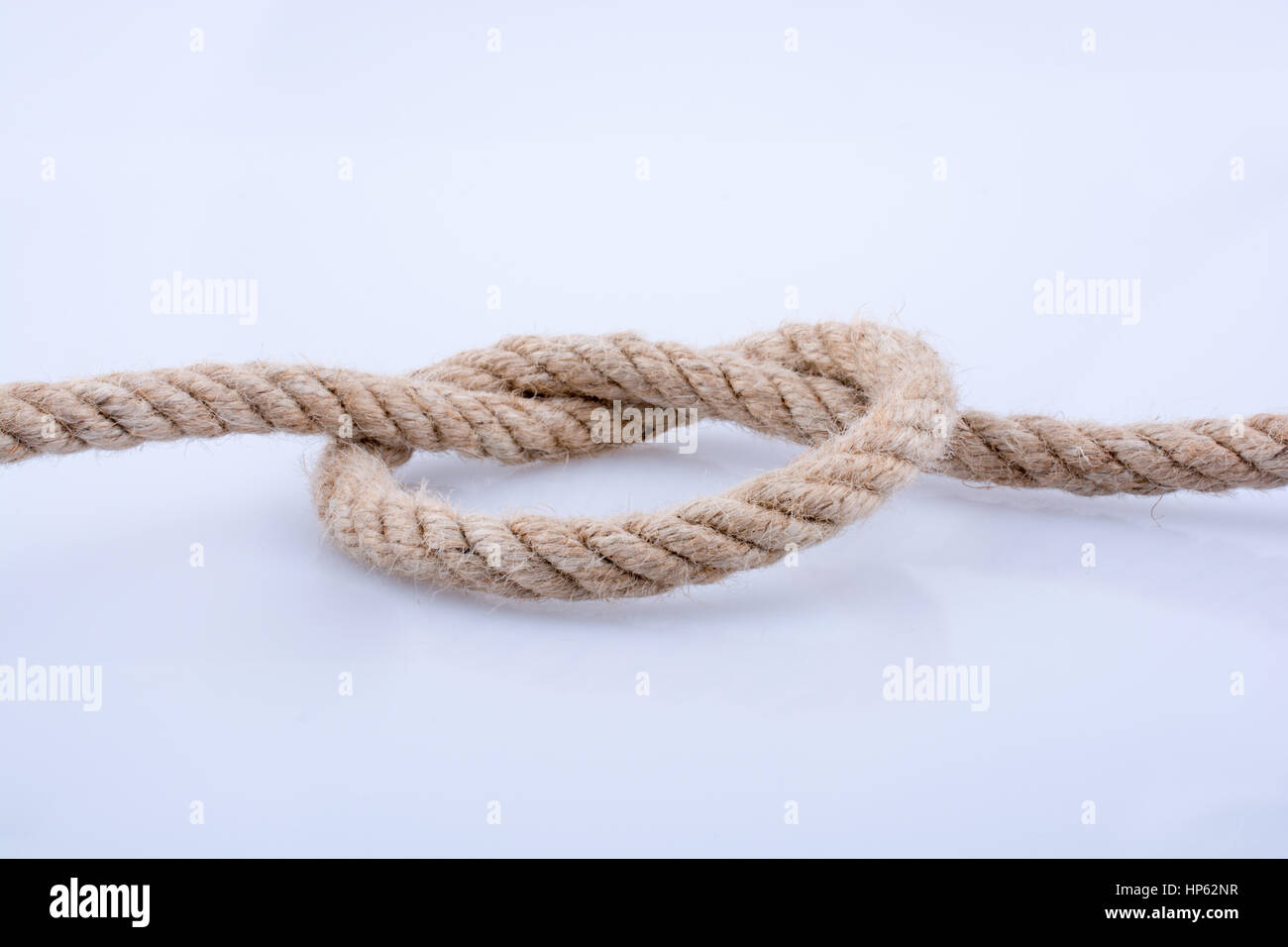 rope knot on a white background Stock Photo - Alamy