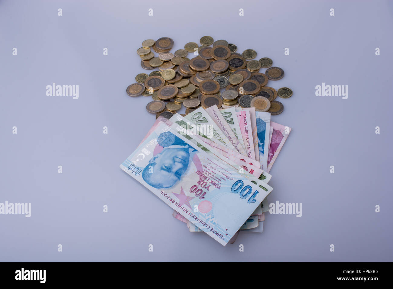 Turkish Lira coins and banknotes side by side on white background Stock ...