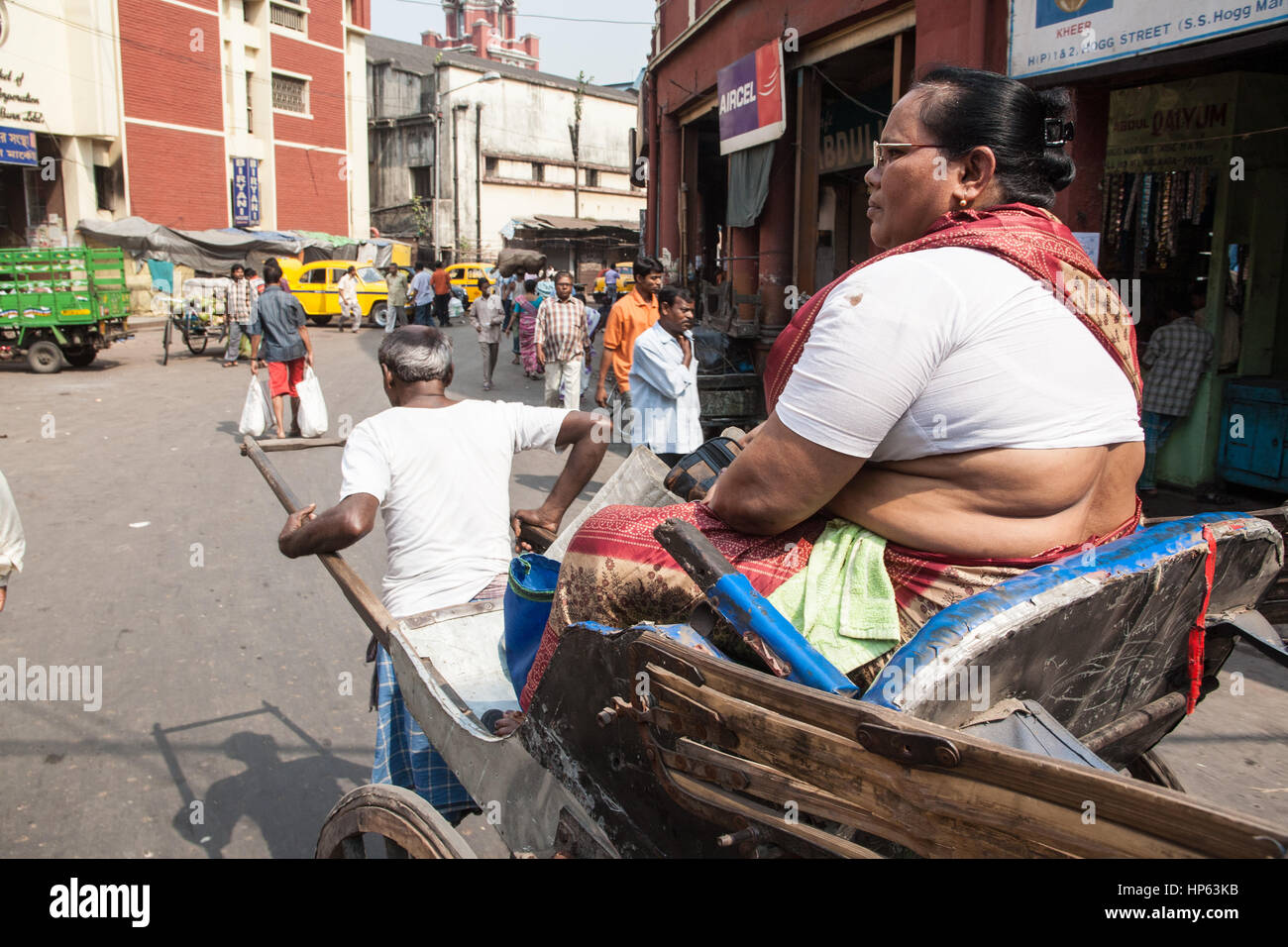 Human rickshaw puller hi-res stock photography and images - Alamy