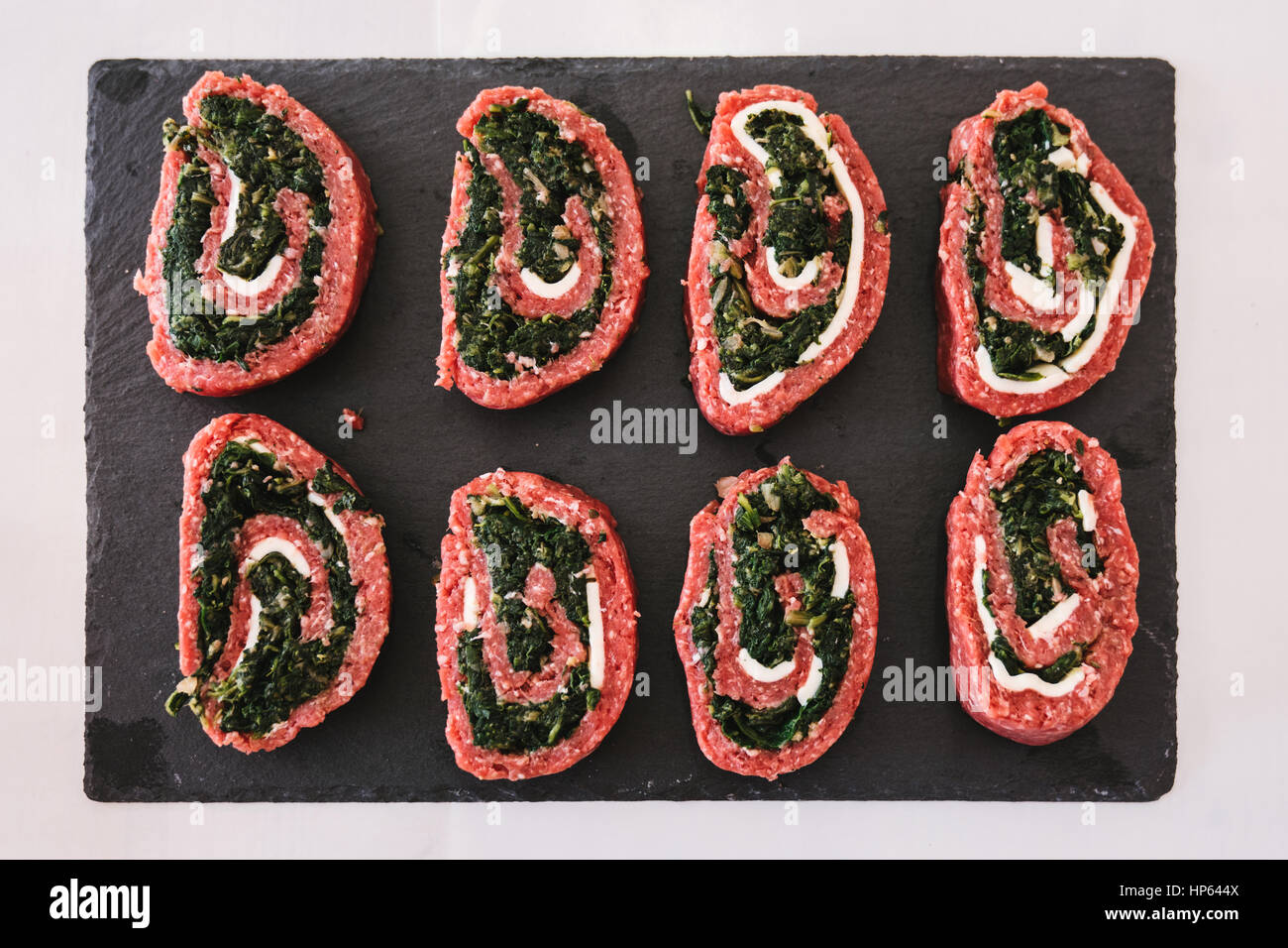 Sliced roast beef stuffing and ready to be cooked Stock Photo - Alamy