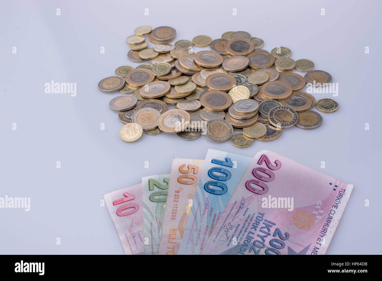 Turkish Lira coins and banknotes side by side on white background Stock ...