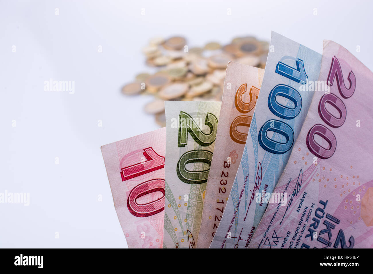 Turkish Lira coins and banknotes side by side on white background Stock ...