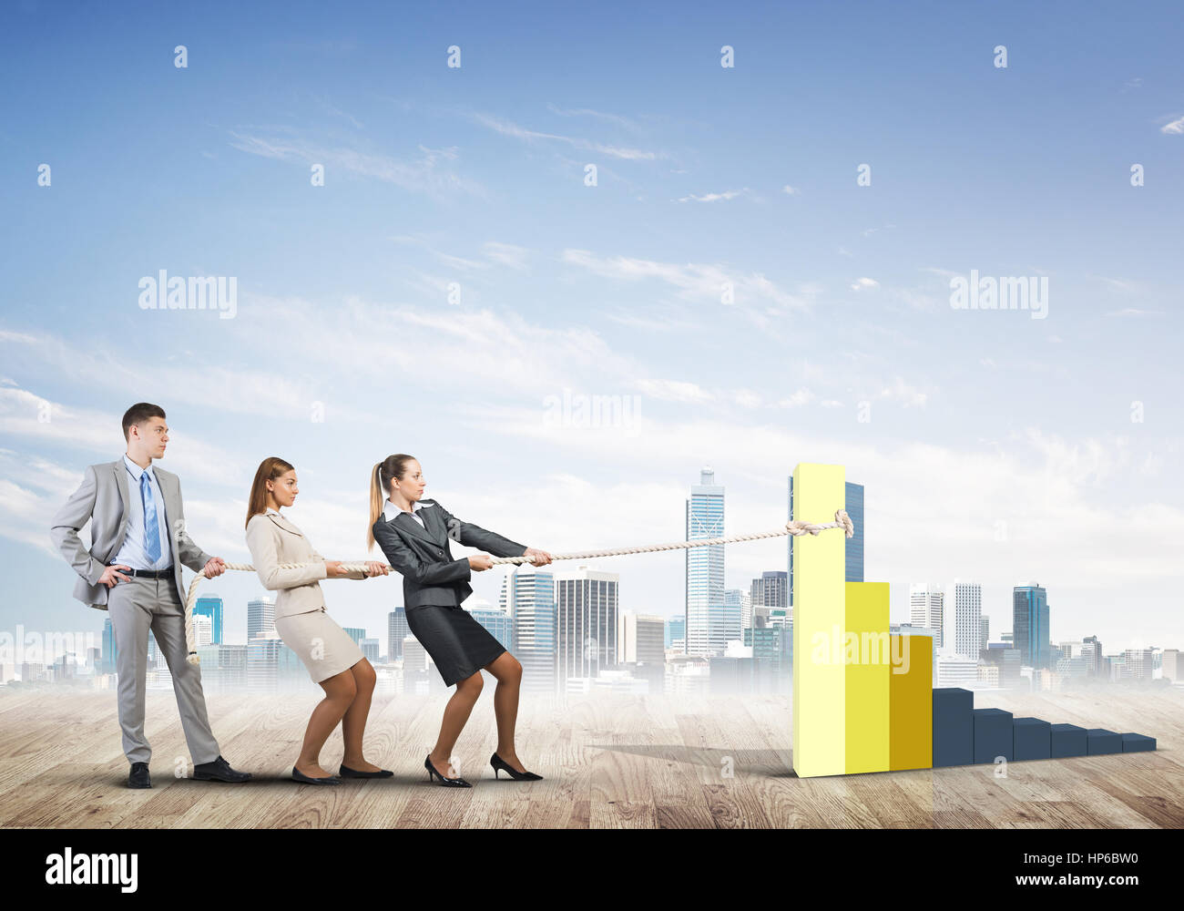 Young business people pulling up graph bar using rope Stock Photo - Alamy
