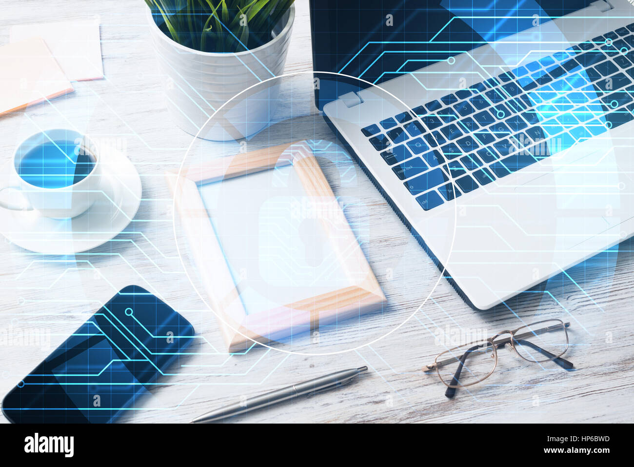 Opened laptop and other office stuff on wooden table Stock Photo - Alamy