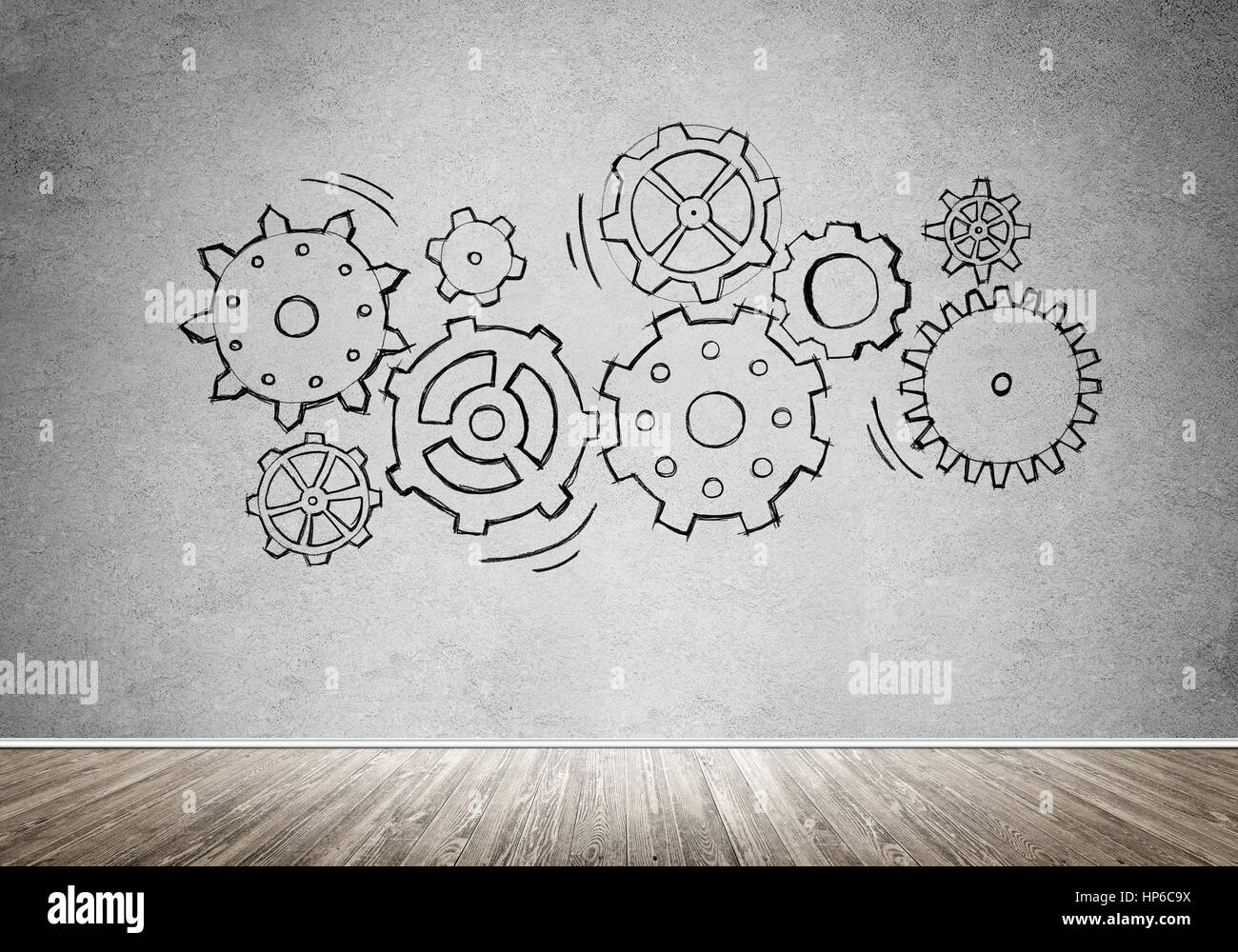Gear hand drawn mechanism on gray wall Stock Photo - Alamy