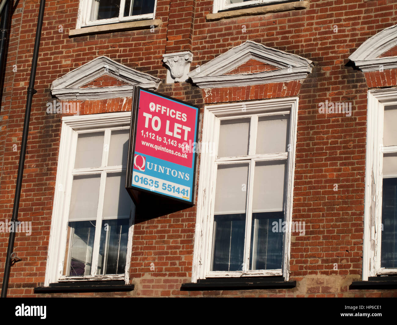 Commercial estate agent to let sign over vacant retail units Stock ...