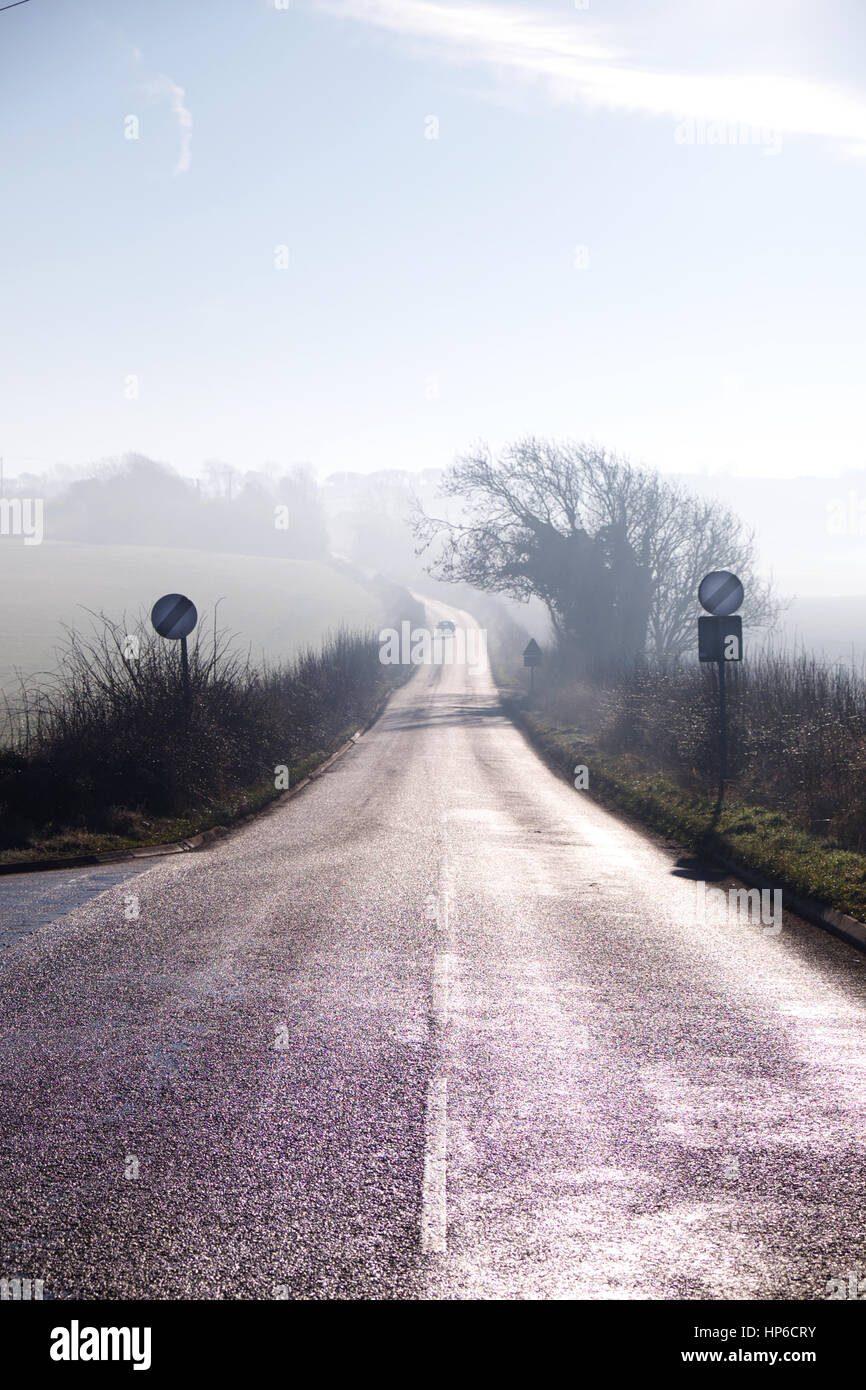 Misty winding country lane hi-res stock photography and images - Alamy