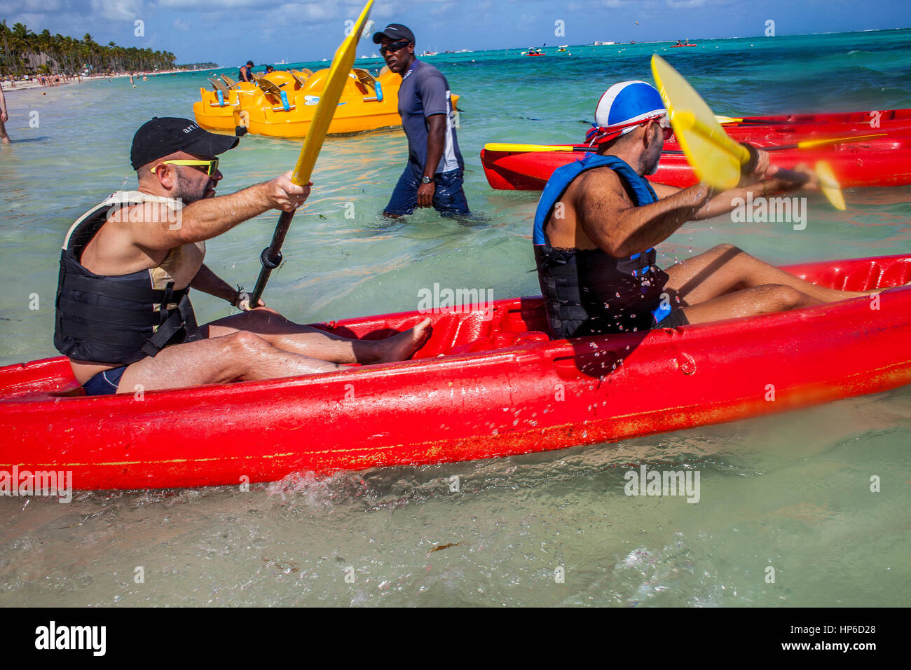 People canoeing in Bibijagua beach, Punta Cana, Dominican Republic ...