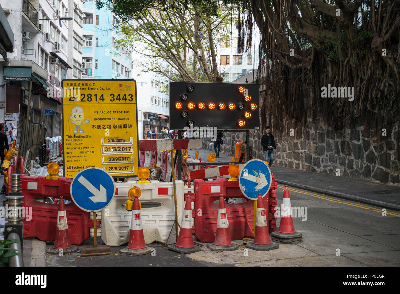 Roadworks signs and arrows in Hong Kong Stock Photo - Alamy