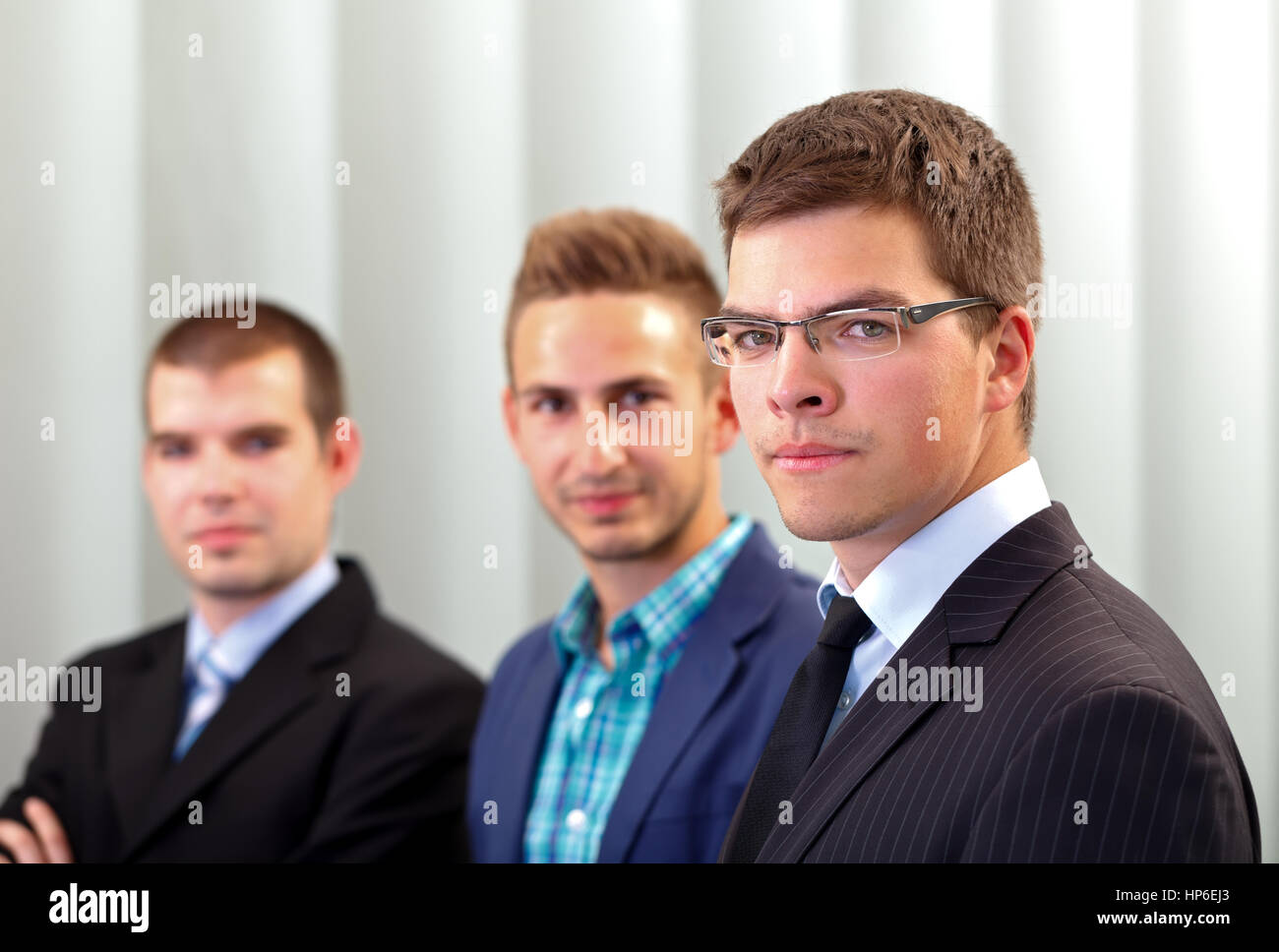 Three business men in their office after a successful deal Stock Photo ...